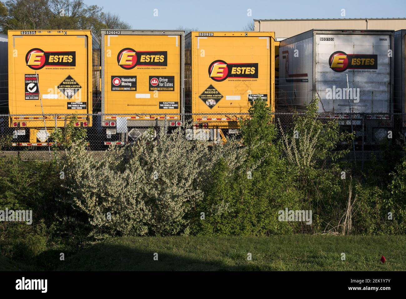 Truck trailers with logos outside of a facility occupied by Estes ...