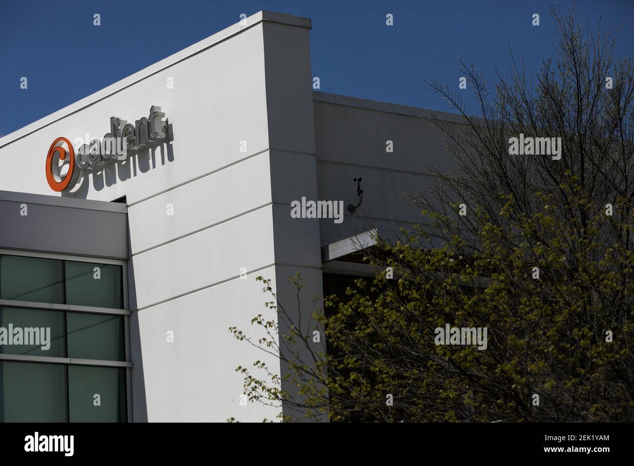 A logo sign outside of a facility occupied by Cadient Group in Malvern ...