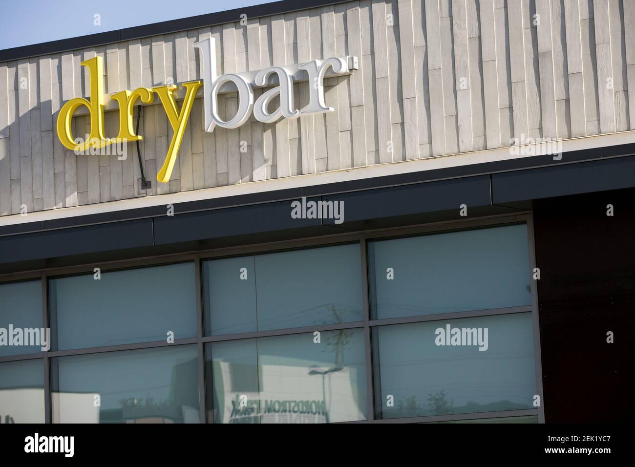 A logo sign outside of a Drybar salon location in King of Prussia ...