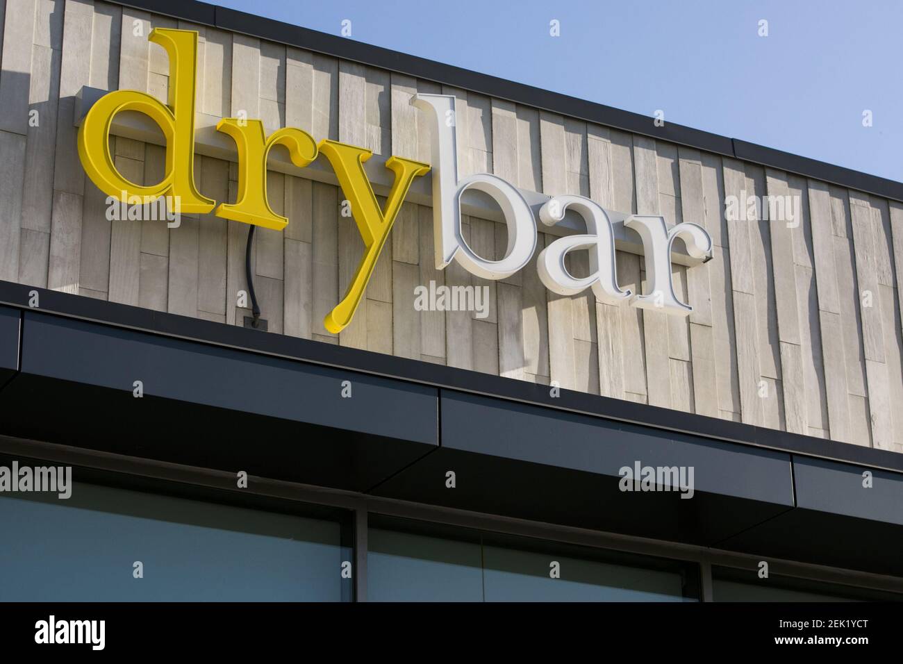 A logo sign outside of a Drybar salon location in King of Prussia ...
