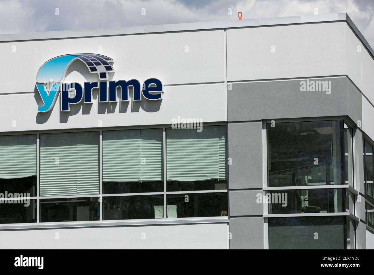 A logo sign outside of the headquarters of YPrime in Malvern ...
