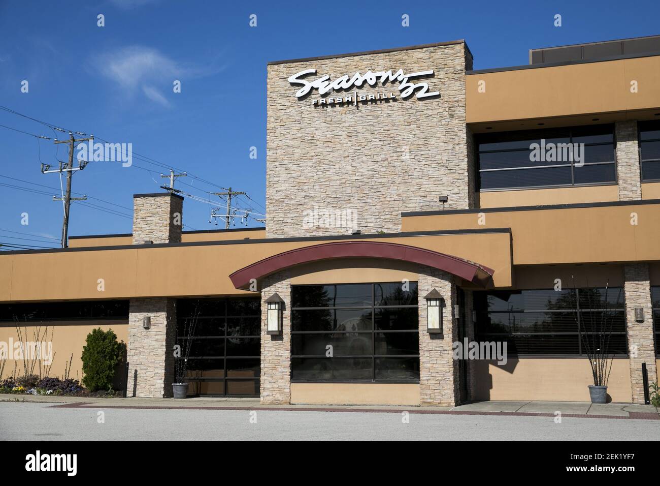 A logo sign outside of a Seasons 52 restaurant location in King of ...