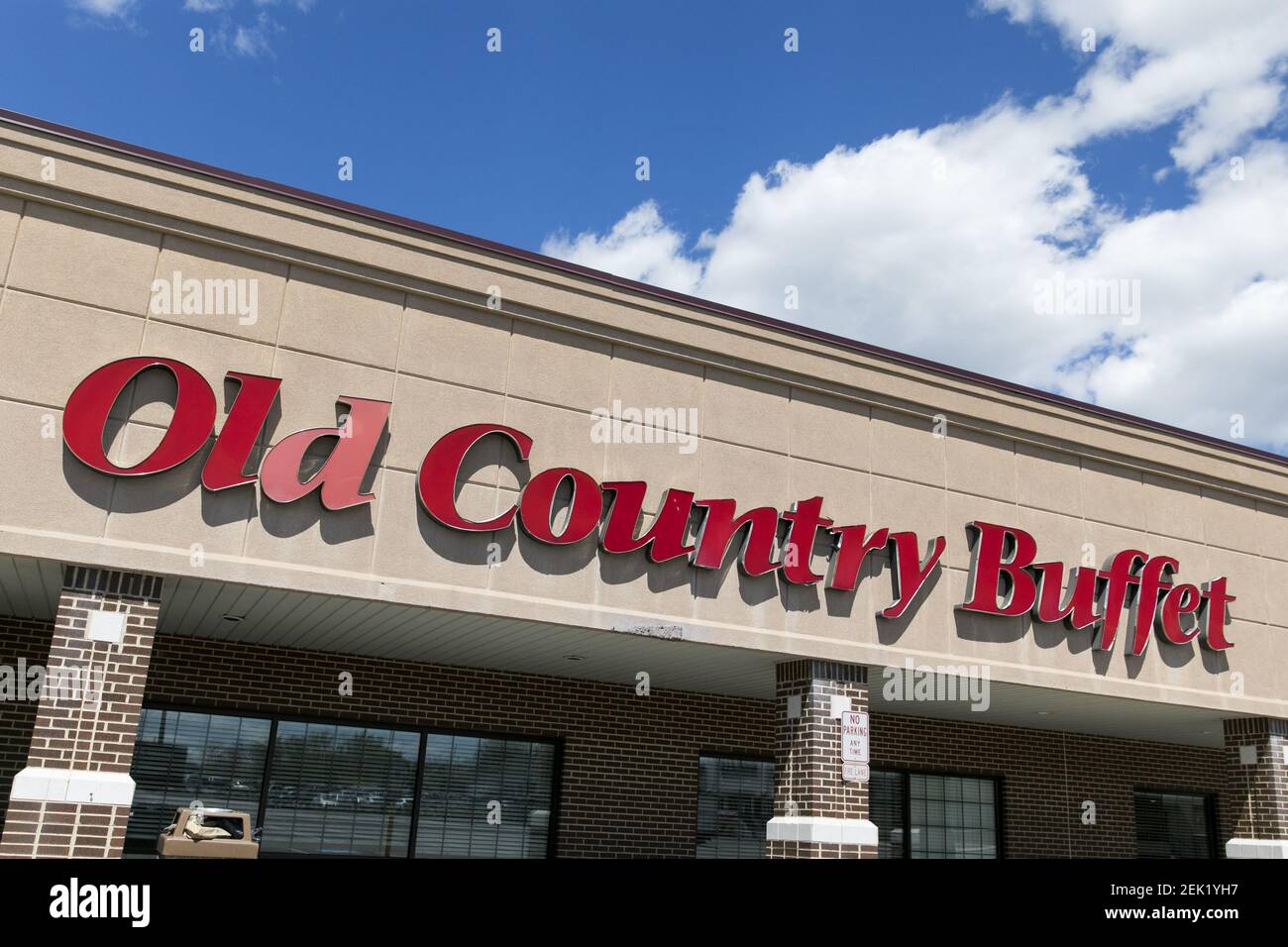 A logo sign outside of a Old Country Buffet restaurant location in ...