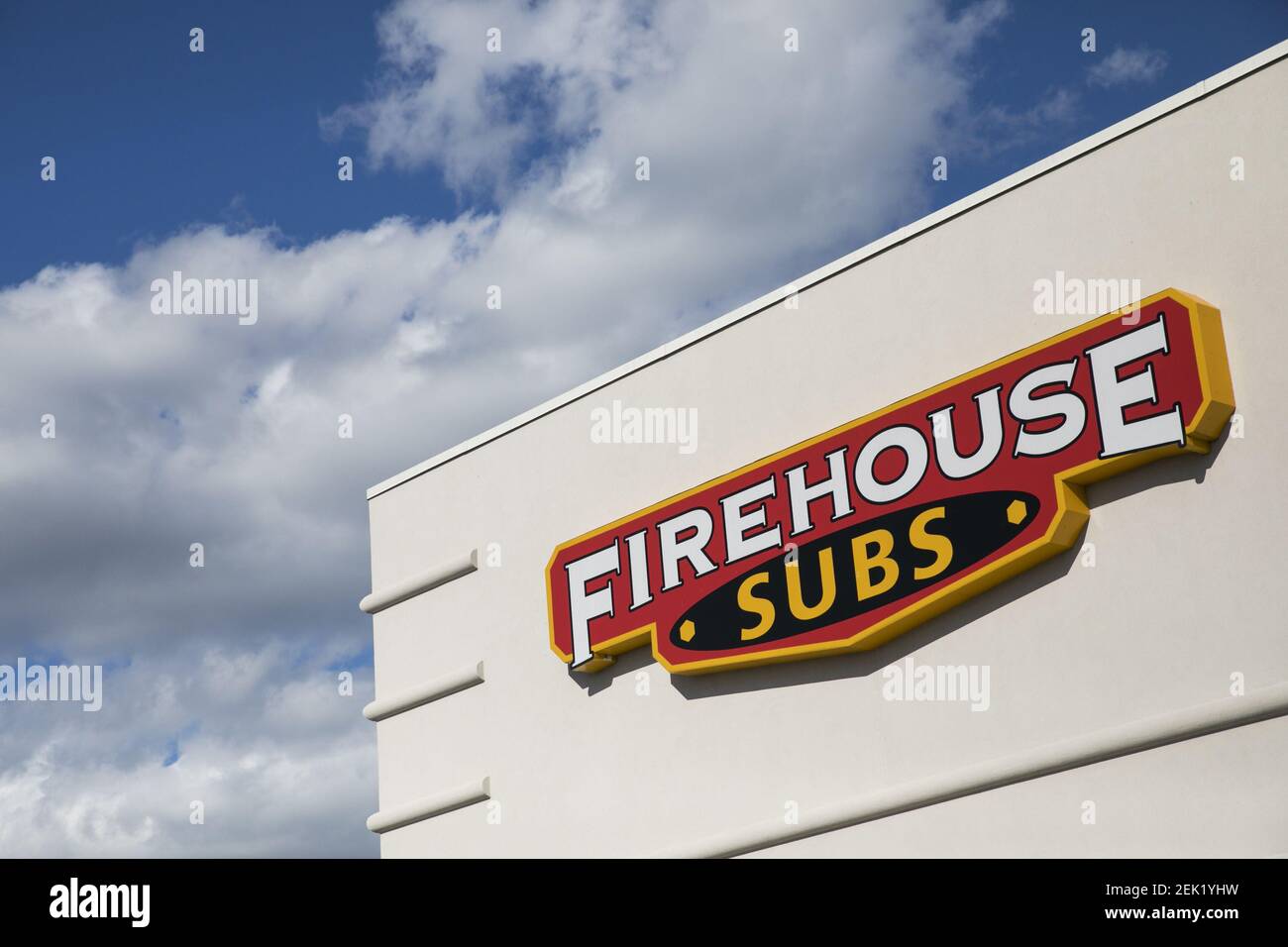 A logo sign outside of a Firehouse Subs restaurant location in ...