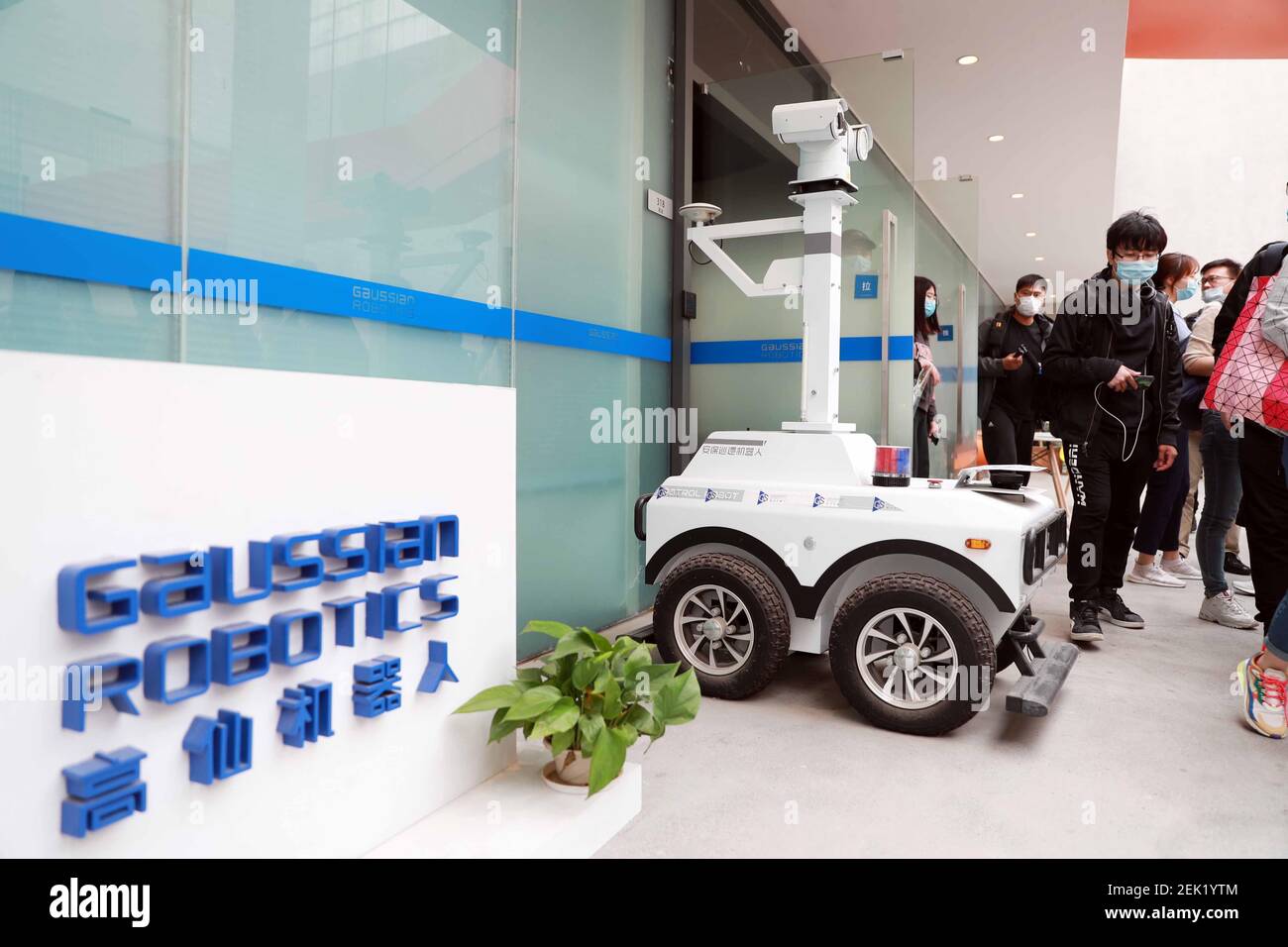 Two cleaning robots from Gaussian Robotics work under the headquarter ...