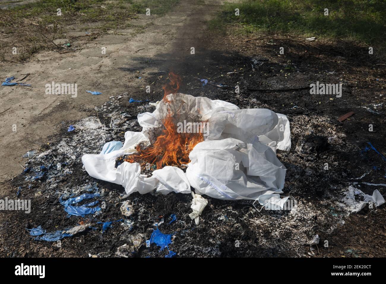 Members of Al-Markazul Islami Bangladesh burns the personal protective ...