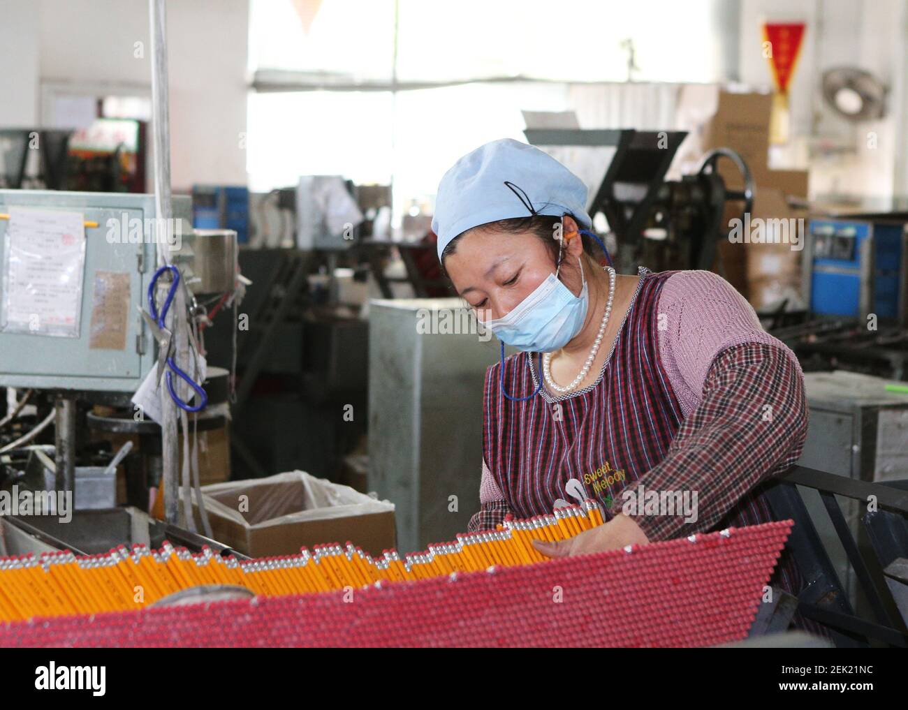 Workers are busy at producing pencil of Chung Hwa, a national famous ...