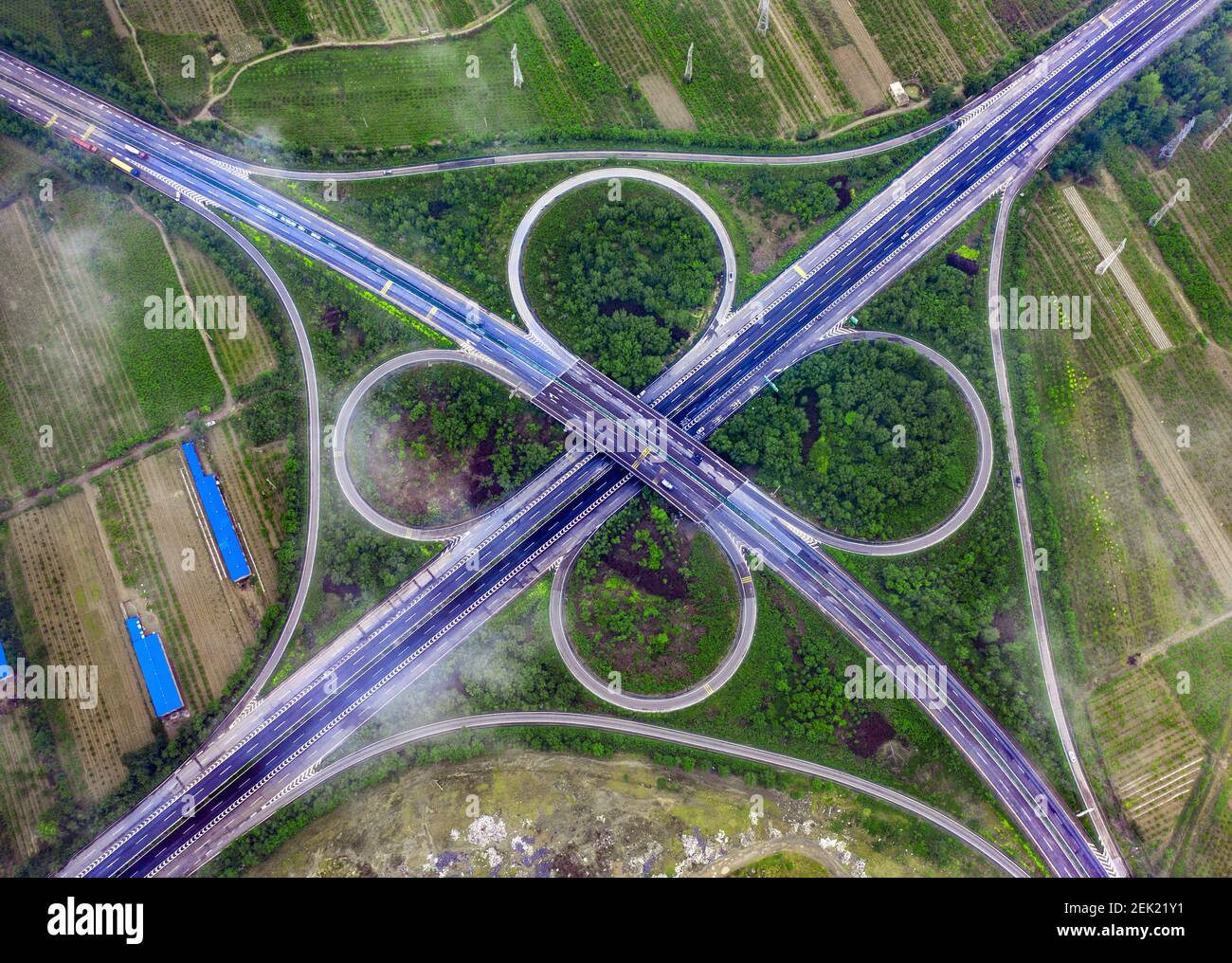 An aerial view of a complicated interchange linking different ...