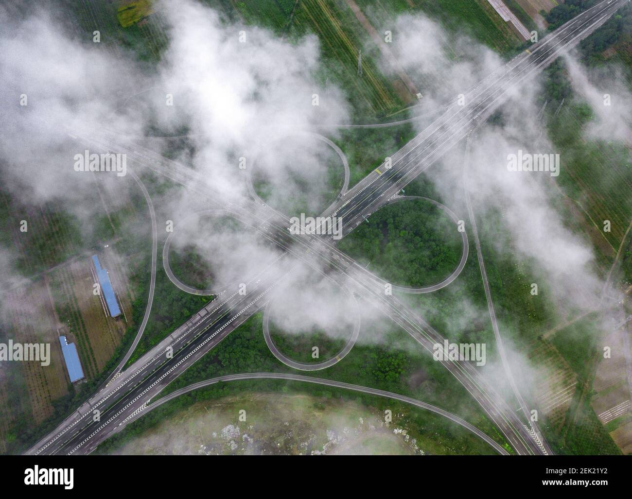 An aerial view of a complicated interchange linking different ...