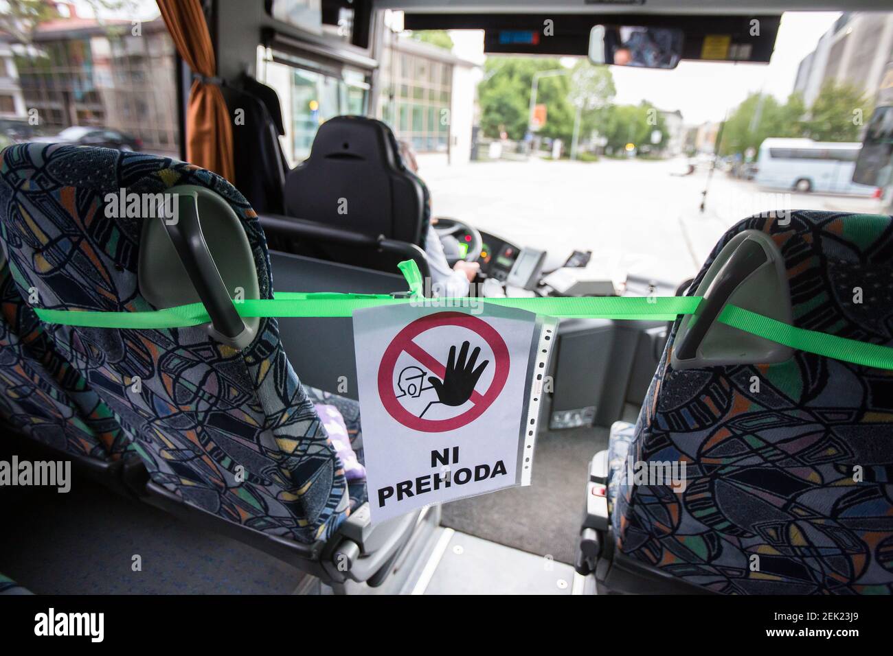 A ‘No passage’ sign seen inside a bus as public transport resumes under ...