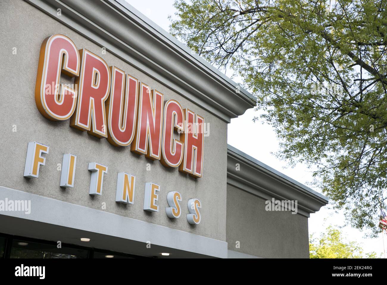 A logo sign outside of a Crunch Fitness location in Washington, D.C ...