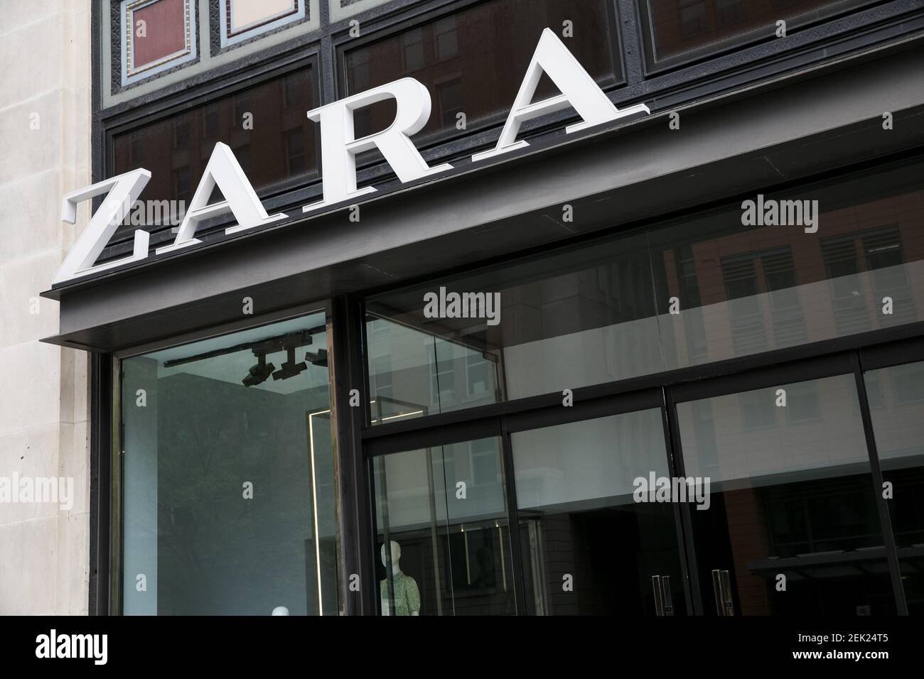 A logo sign outside of a Zara retail store location in Washington, D.C ...