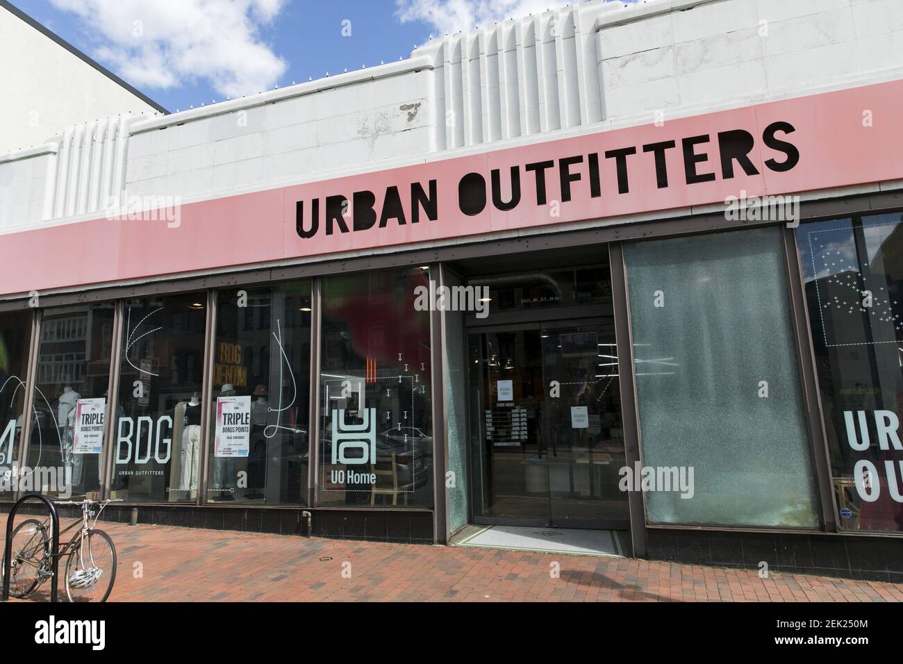 A logo sign outside of a Urban Outfitters retail store location in ...