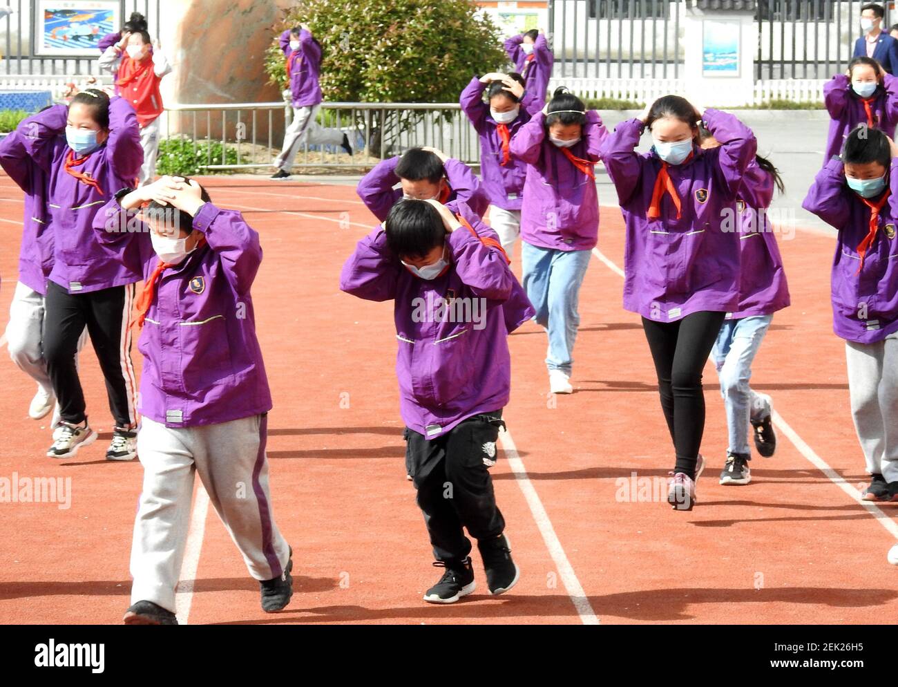 Primary school students conduct safety drill in the campus during China ...