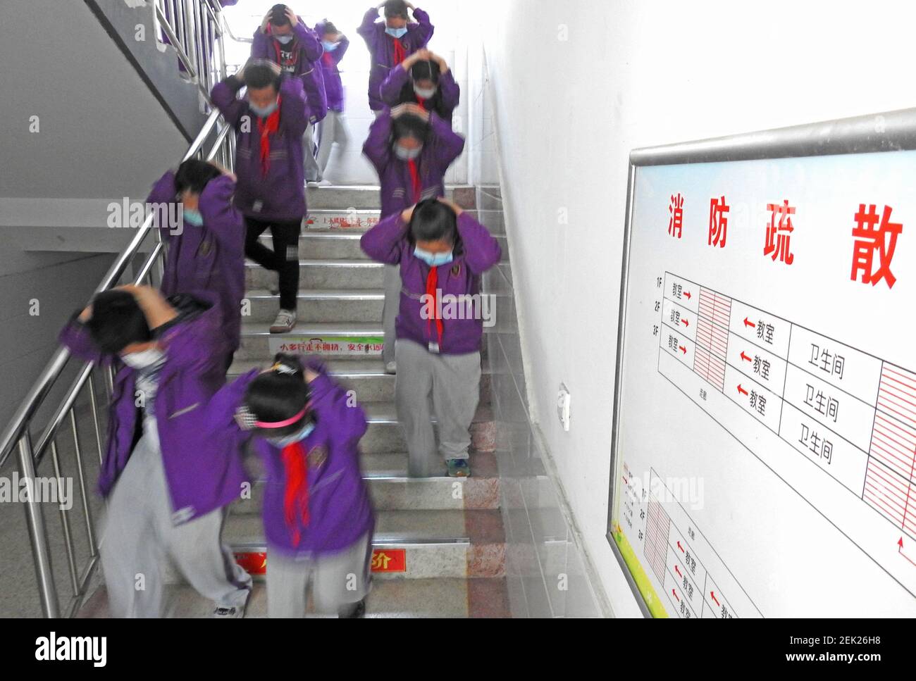 Primary school students conduct safety drill in the campus during China ...