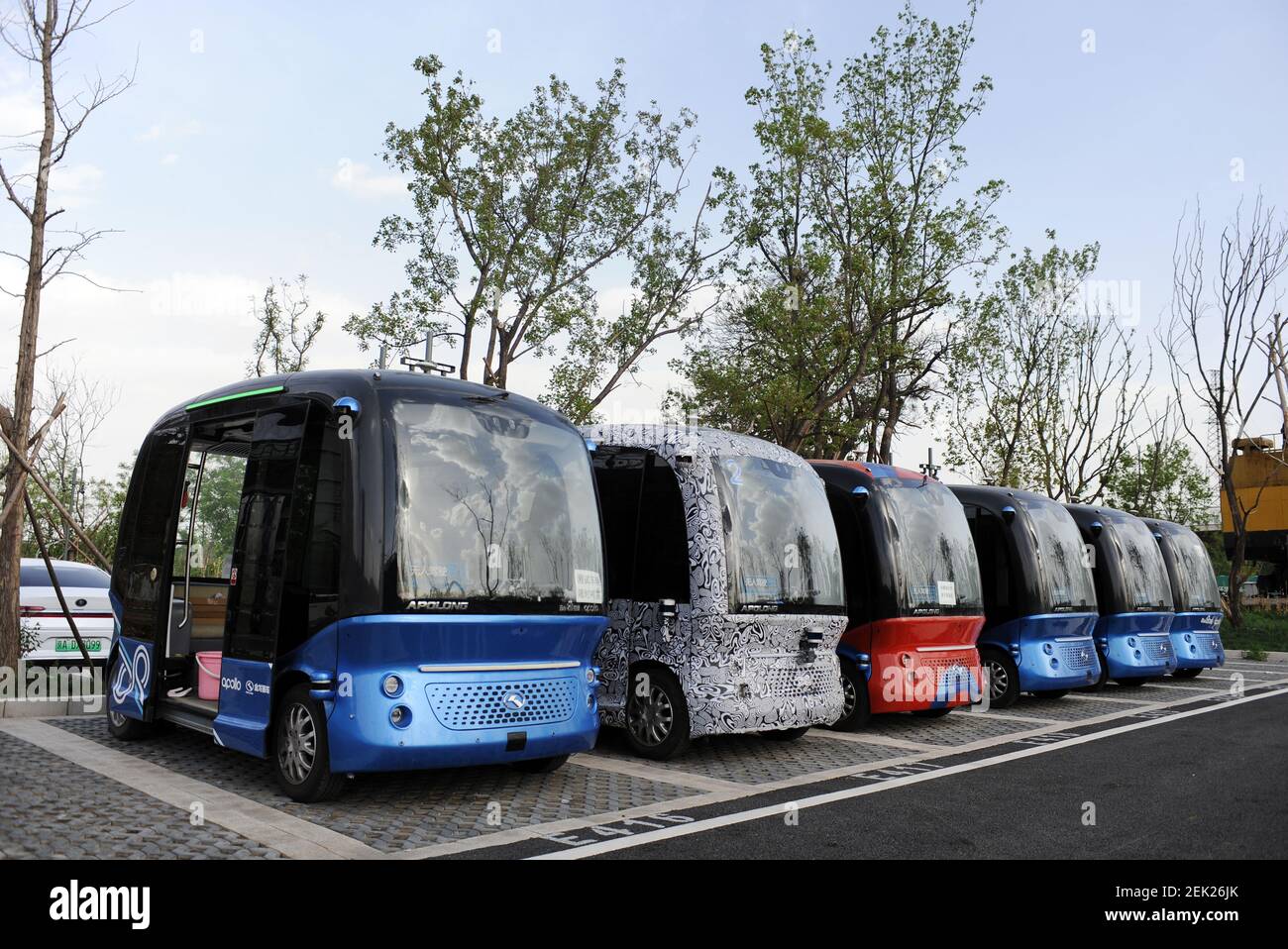 Unmanned buses operate at Shougang Yuan in Beijing, China, 11 May 2020 ...