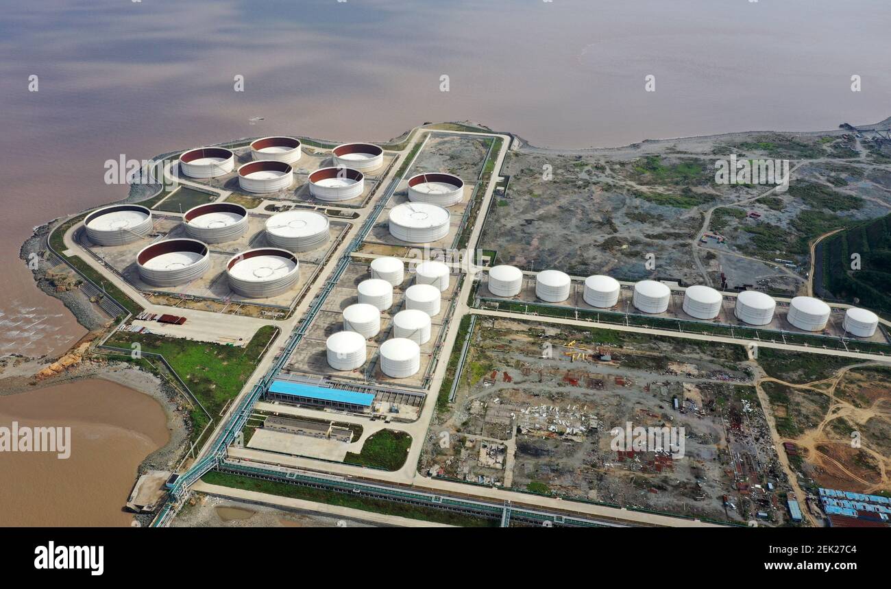 An aerial view of a large oil tanker harbors at the Huangzeshan oil ...