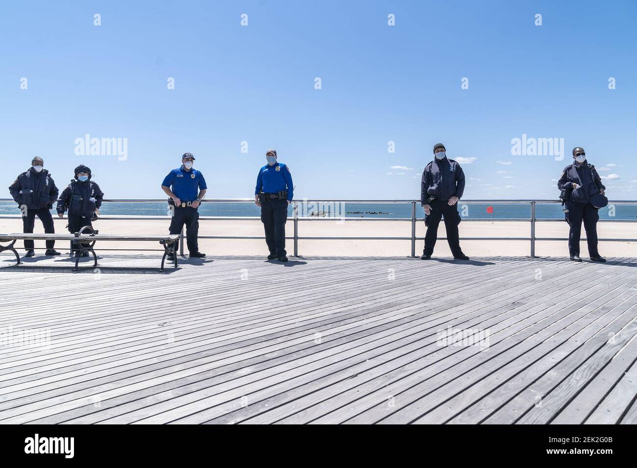 (5/12/2020) Police officers from 60th Precinct patrol boardwalk next to ...