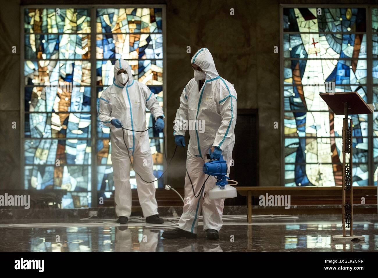 Workers at Don Bosco church on the first day of sanitation of the Roman ...