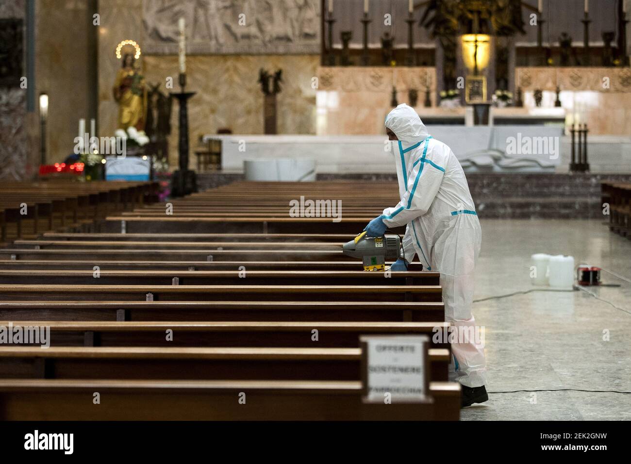 Workers at Don Bosco church on the first day of sanitation of the Roman ...