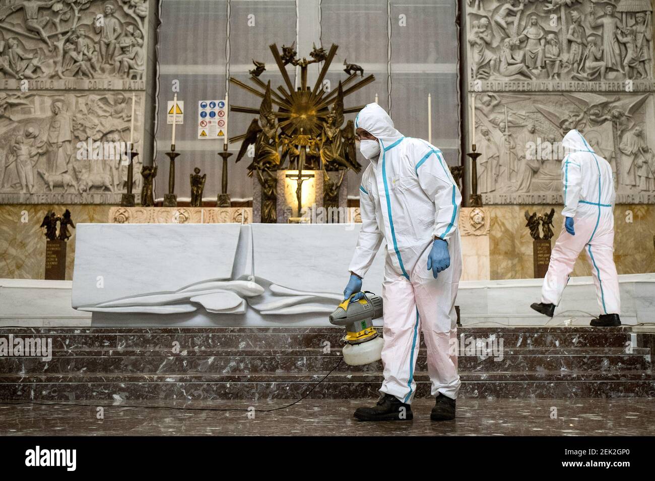 Workers at Don Bosco church on the first day of sanitation of the Roman ...