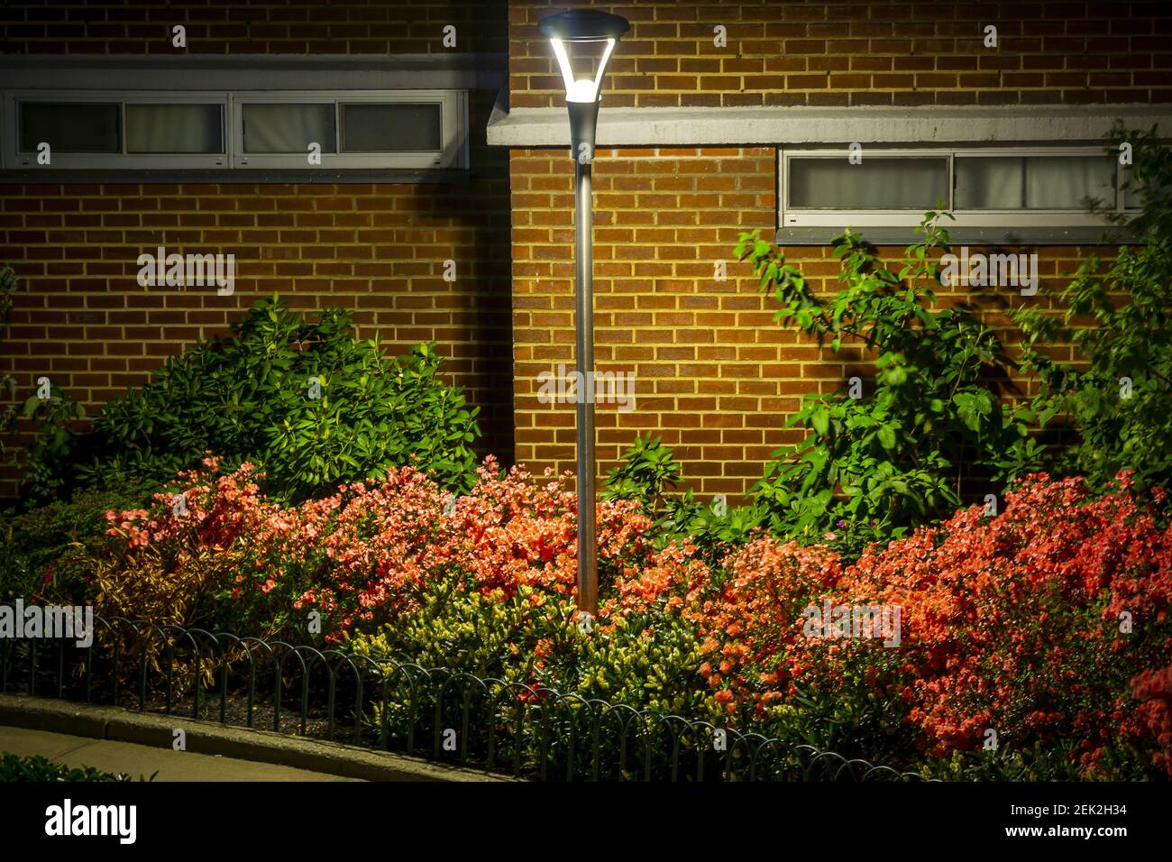 Landscaping in a apartment building complex in Chelsea in New York is ...