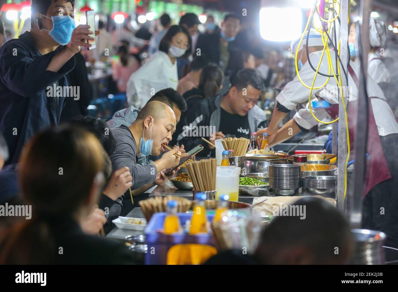 Aerial photos show the famous Huitong Night Market during nighttime ...