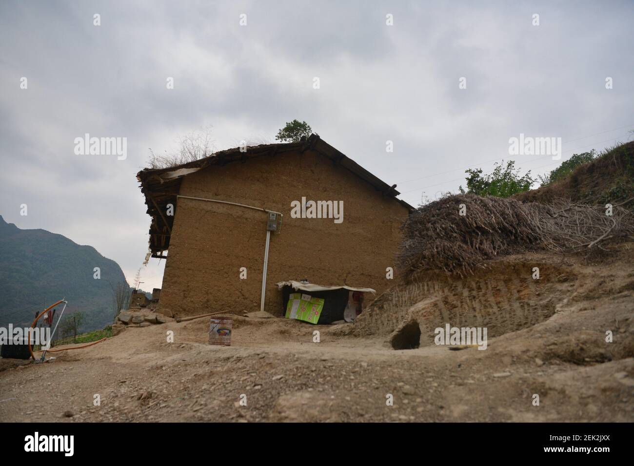 The house in the cliff village, Atulieer village, Zhaojue county ...