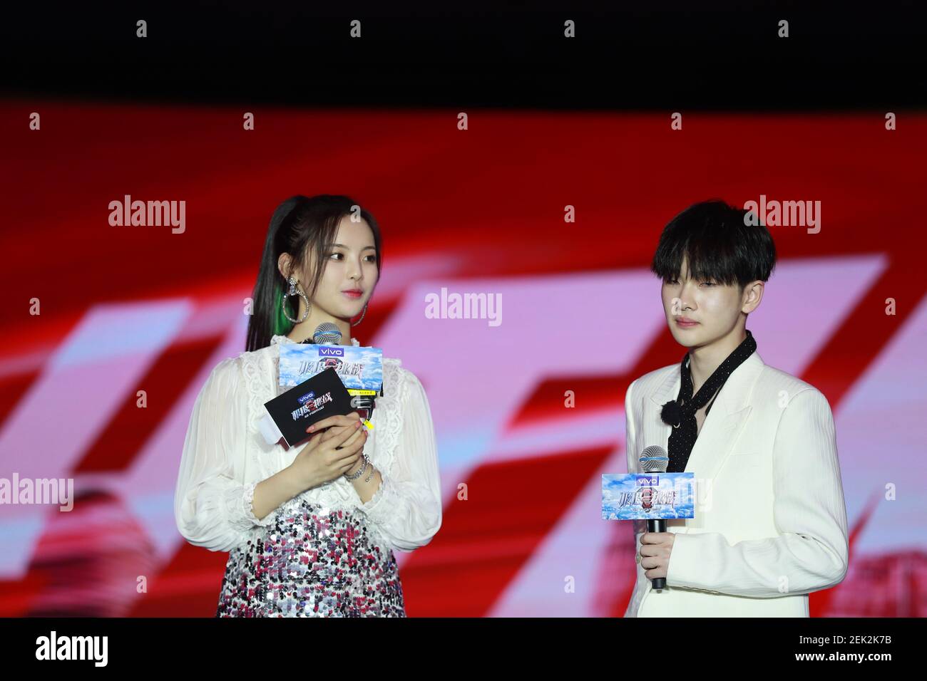 Member of Chinese girl idol girl group Rocket Girls 101 Yang Chaoyue, left, and Chinese rapper ...