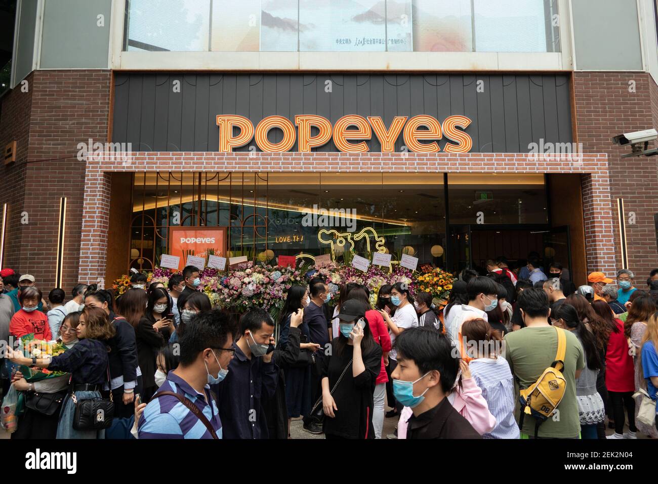 Fried chicken chain Popeyes opens its first outlet in the financial hub ...