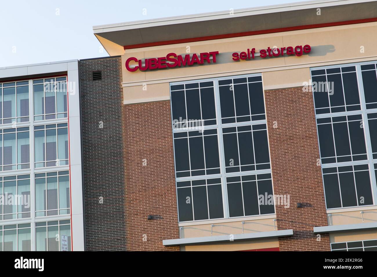 A logo sign outside of CubeSmart self-storage facility in Ashburn ...