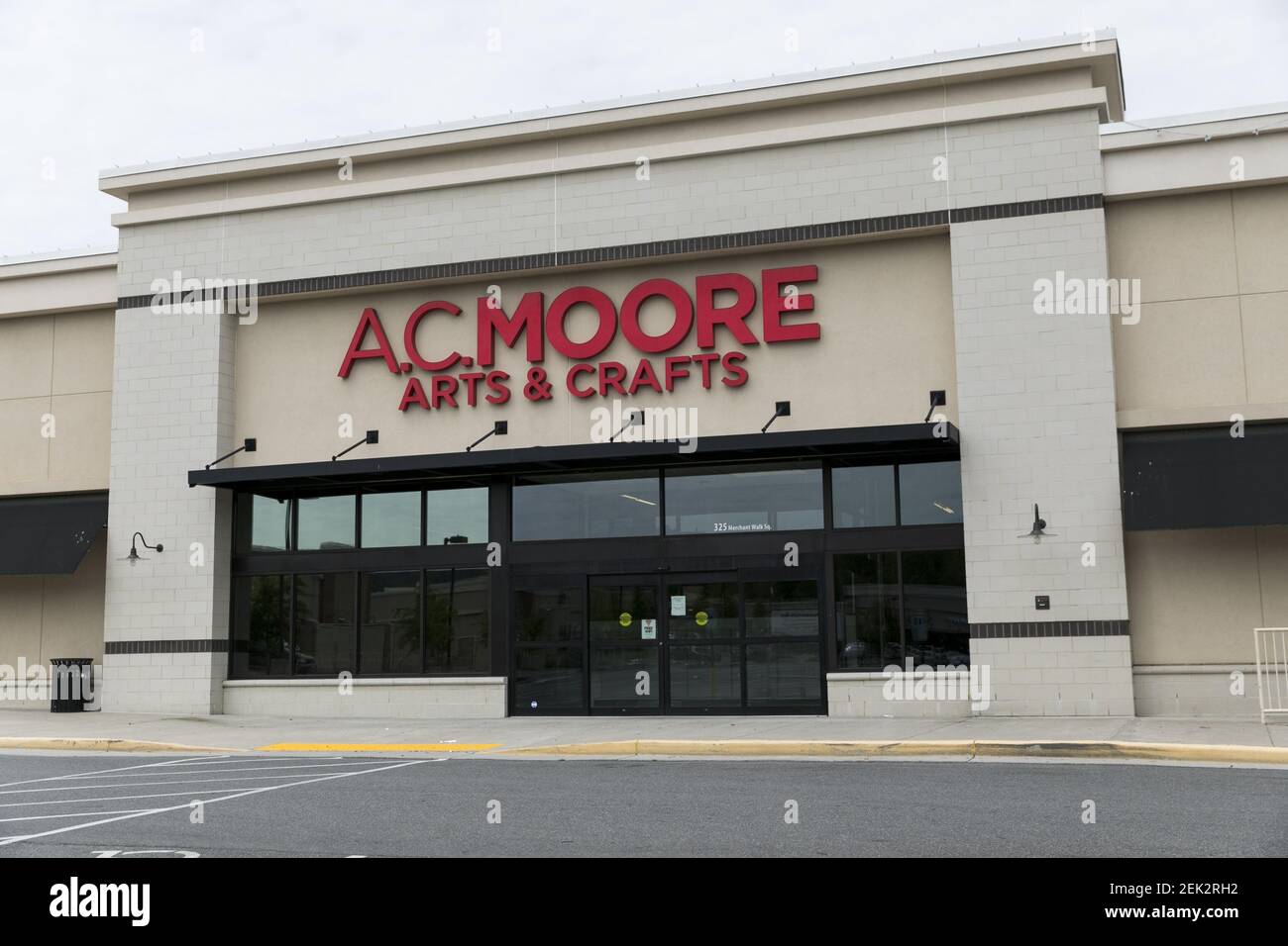 A logo sign outside of a defunct A.C. Moore retail store location in ...