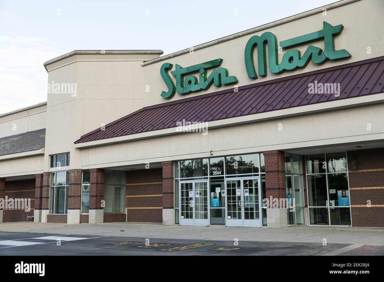 A logo sign outside of a Stein Mart retail store location in Richmond ...