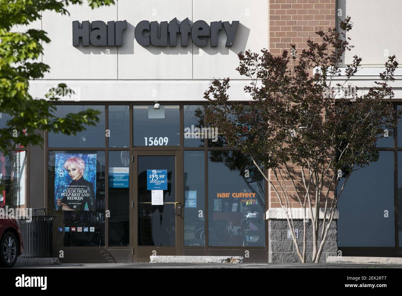 A logo sign outside of a Hair Cuttery location in Midlothian, Virginia ...