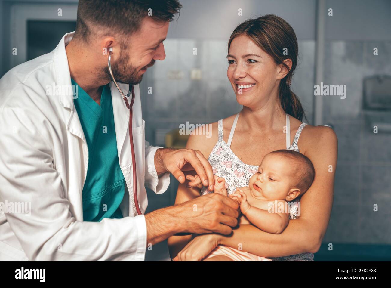 Pediatrician doctor examines baby. Healthcare, people, examination ...
