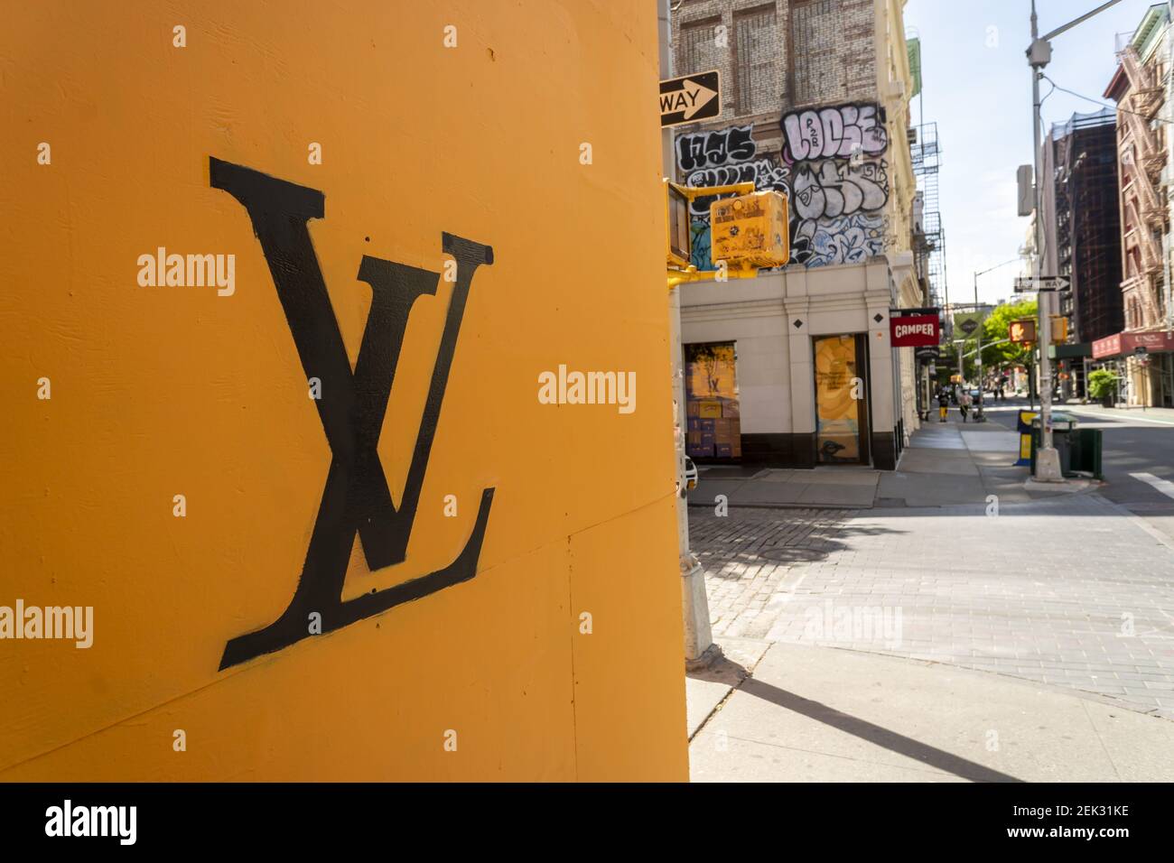 Closed and boarded up Louis Vuitton store in the Soho neighborhood of ...