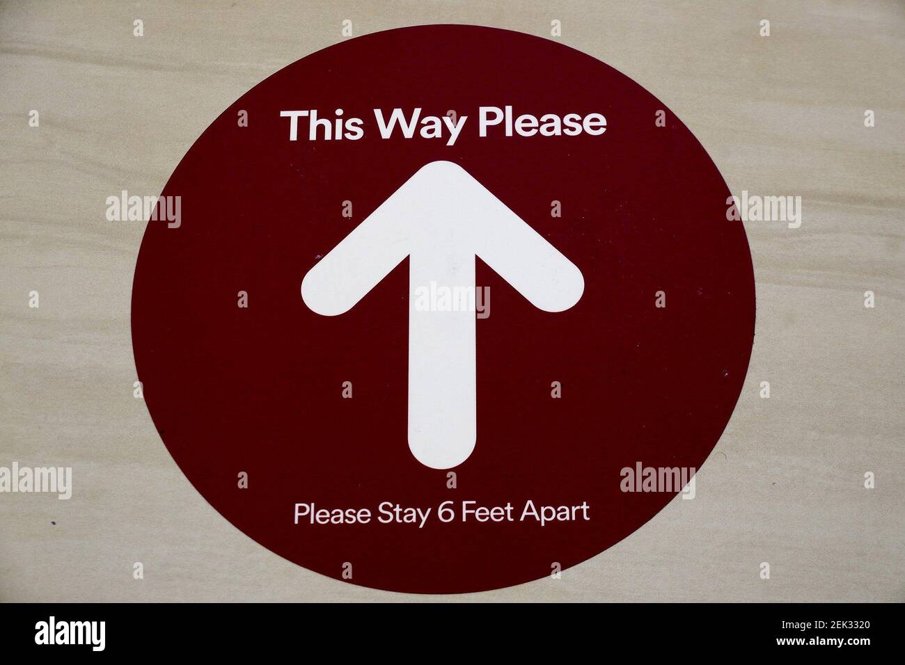 Directional signs are placed on the floor as a reminder of the ...