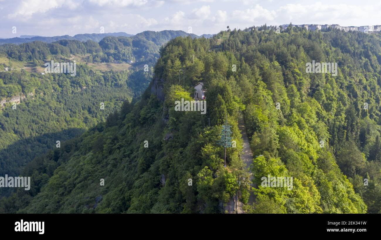 ENSHI, CHINA - MAY 16, 2020 - The scenery of Yumu village on the cliff ...
