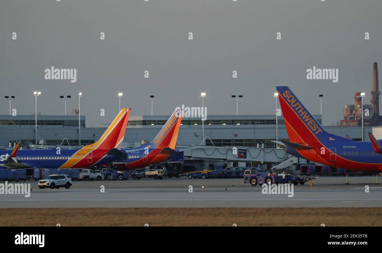 Southwest Airlines planes are parked at gates at Midway International ...