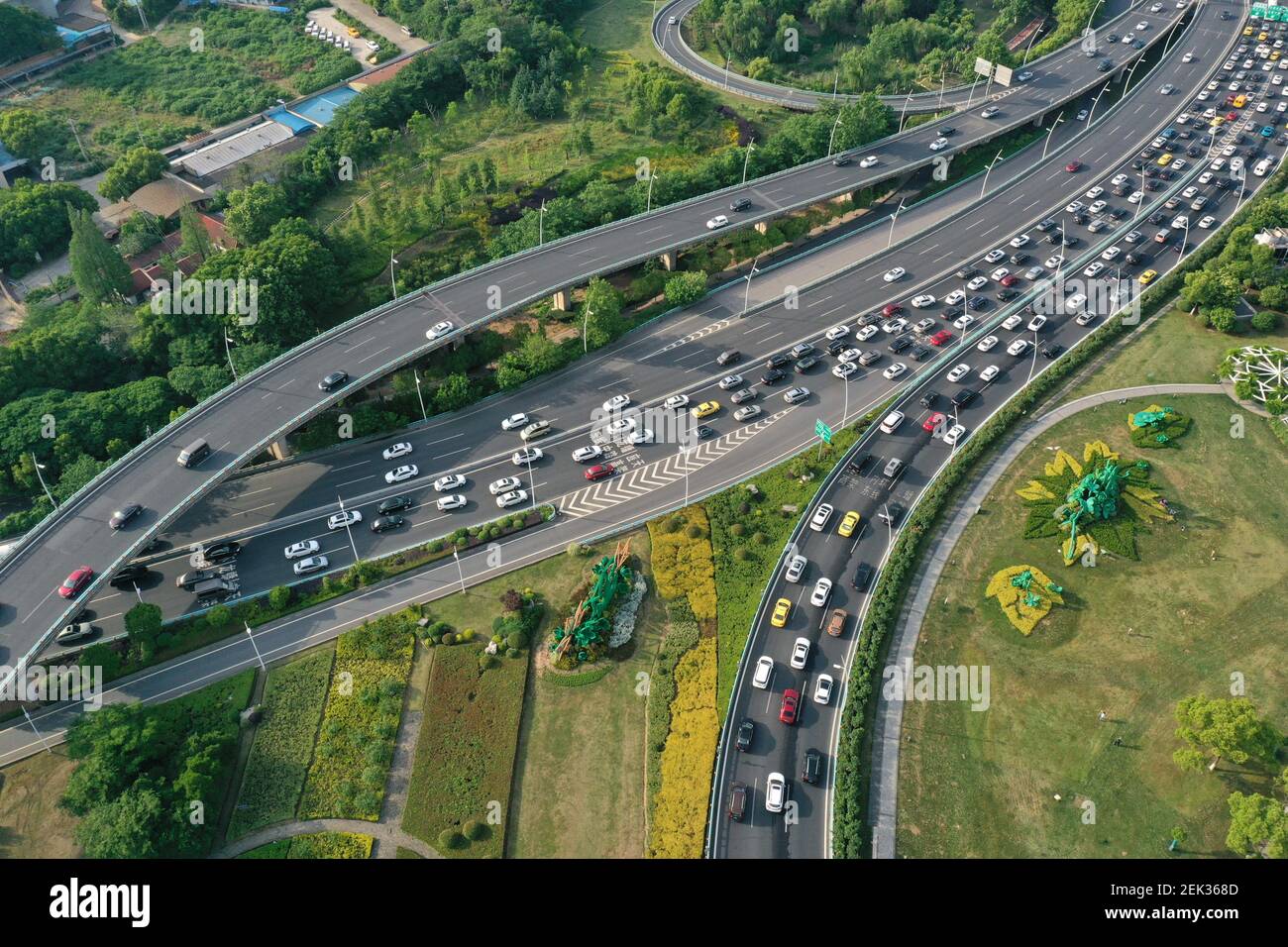 An aerial view of vehicles moving slowly towards the downtown area due ...