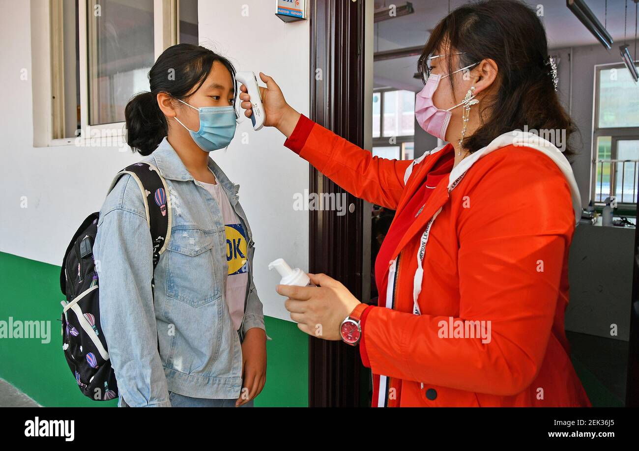 YANTAI, CHINA - MAY 20, 2020 - Primary school students receive ...