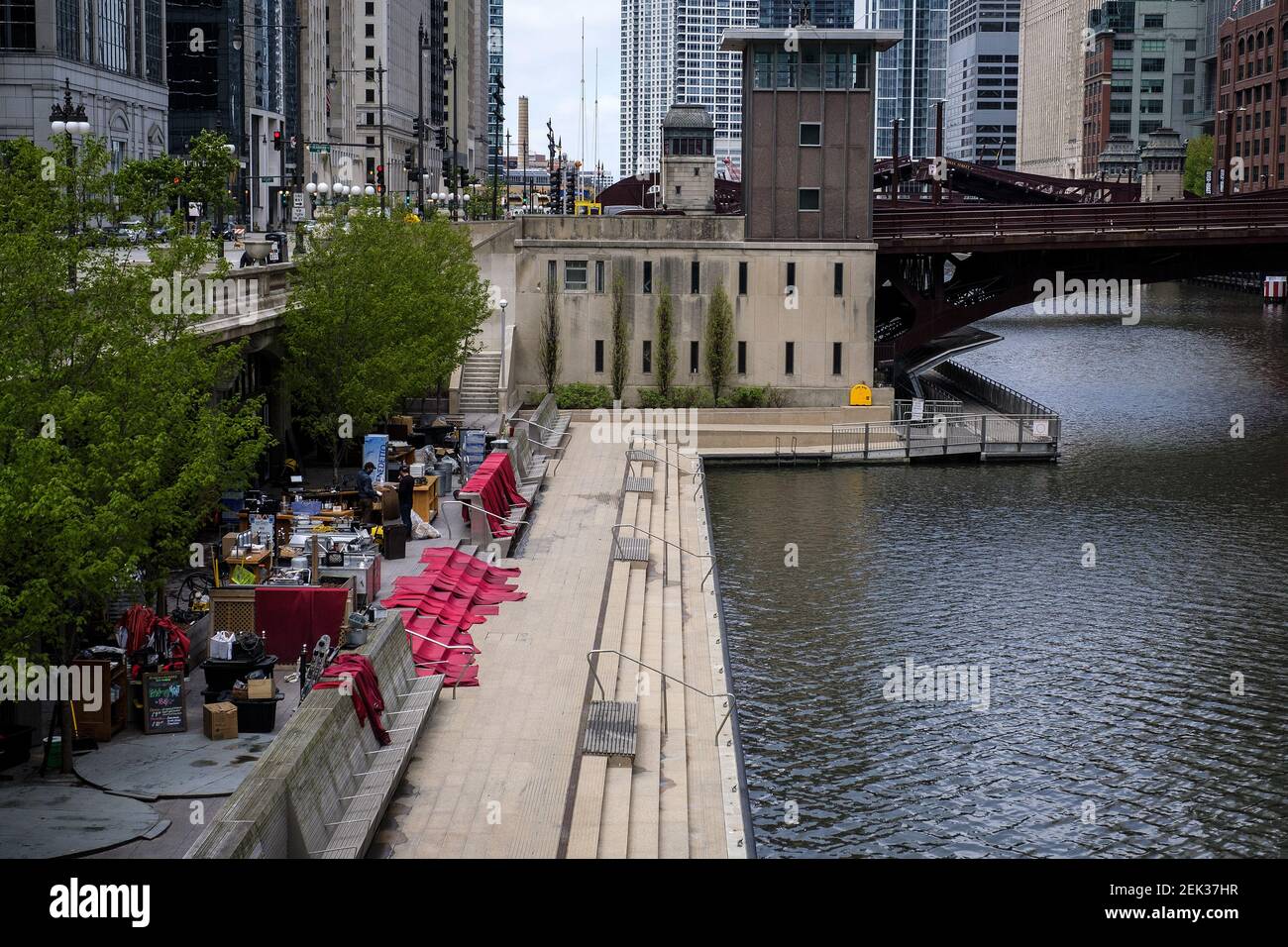 Workers dry out curtains and kitchen equipment at City Winery on the ...