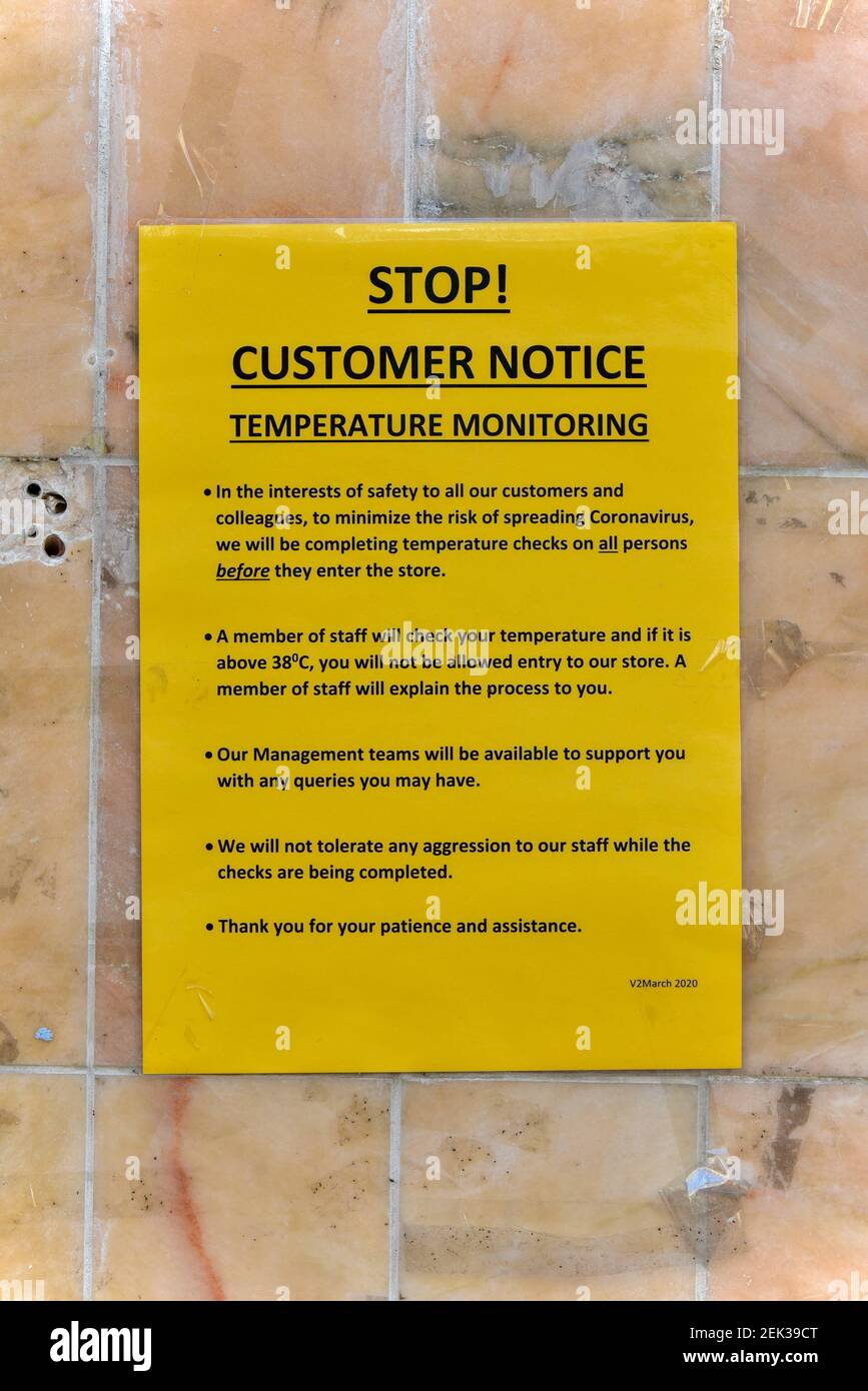 A customer notice sign informing customers of a need for a temperature ...