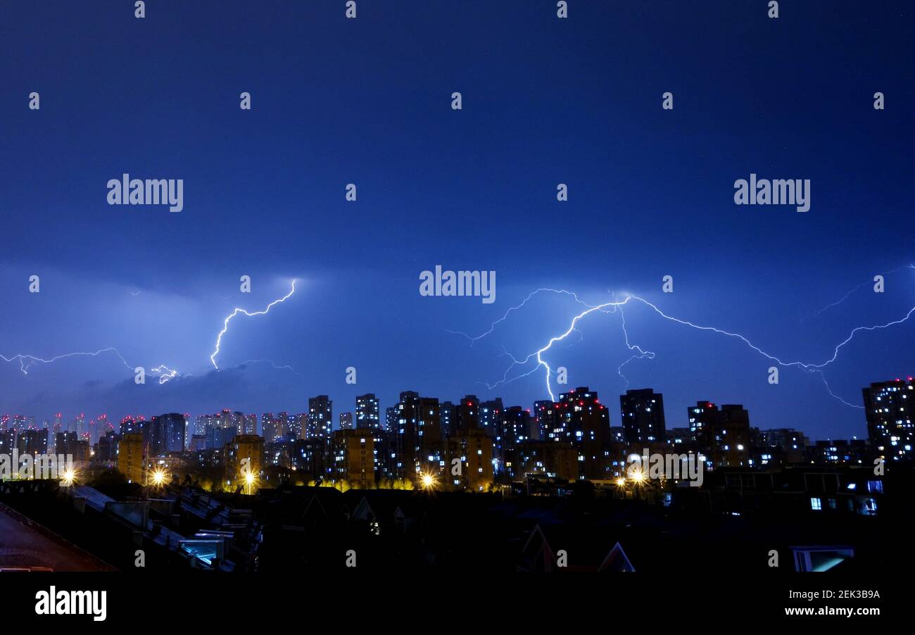 A lightning is caught in the sky of Ganjingzi district, Dalian city ...