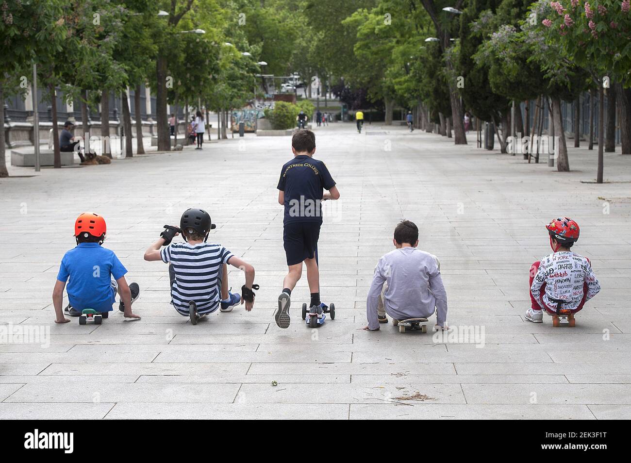 Families in Madrid play during the authorized hours for the children's ...