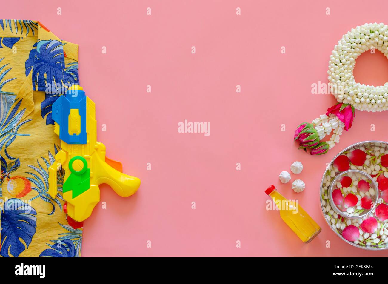 Songkran festival background with flowers and scented water to give ...