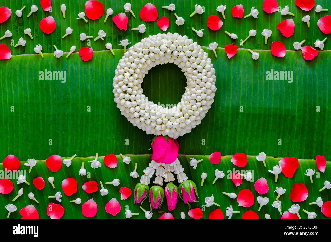 Songkran festival background with jasmine garland and flowers on banana ...