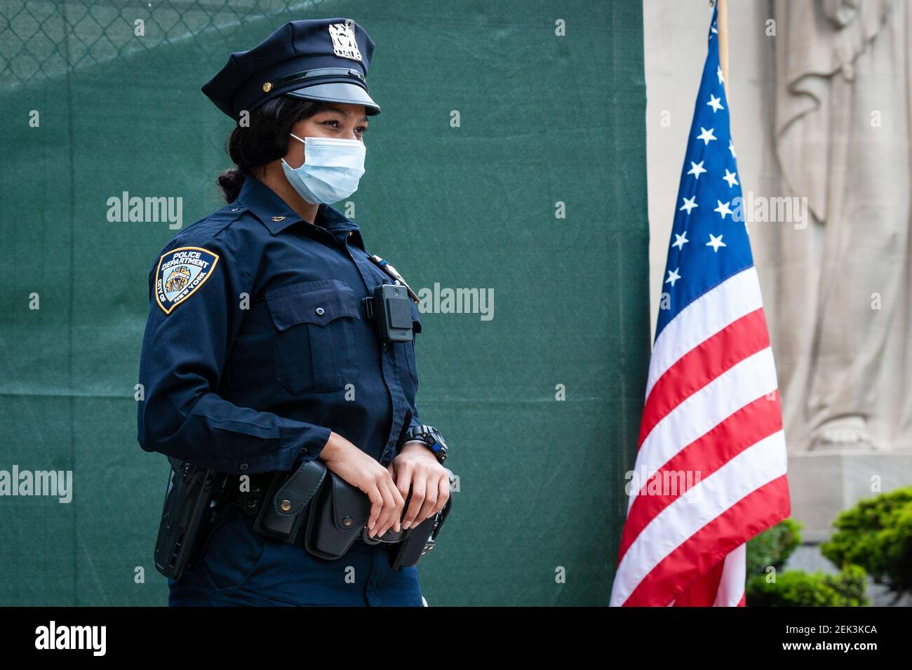An NYPD officer stands guard during the Memorial Day Wreath Laying ...