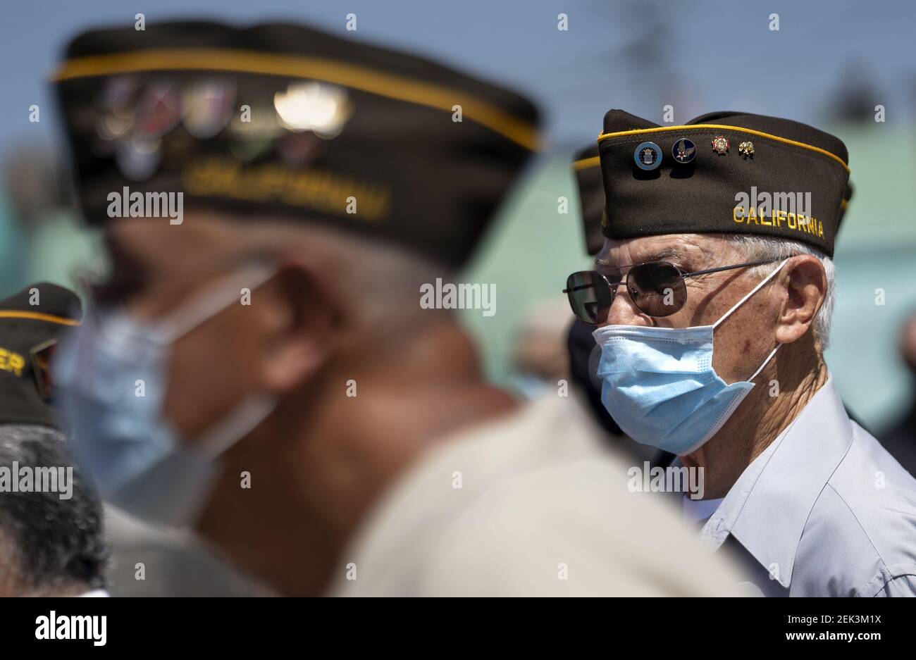 Veterans wearing face masks due to the COVID 19 pandemic participate in ...