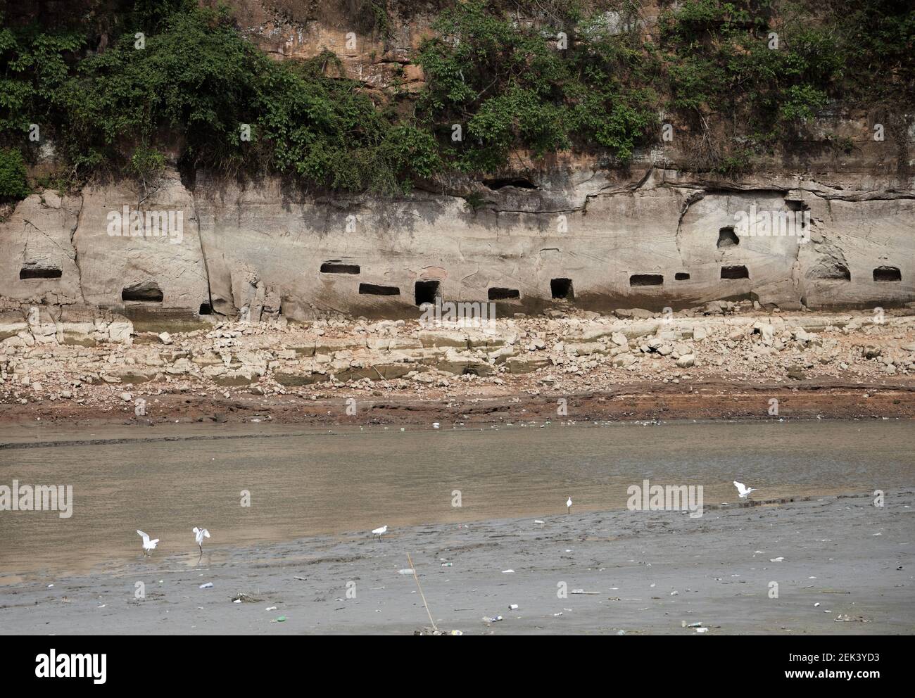 View of the Tang-dynasty sitting buddha sculptures exposed from a water ...